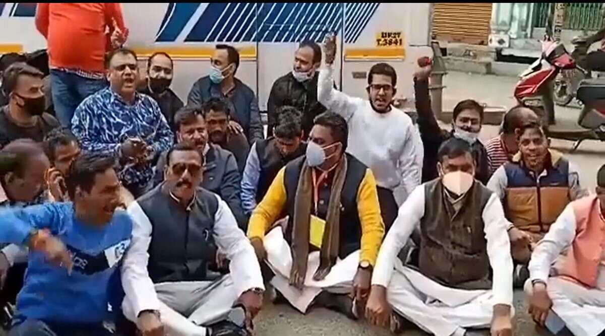 BJP candidate Rajesh Singhal outside the polling station alleging fake ...