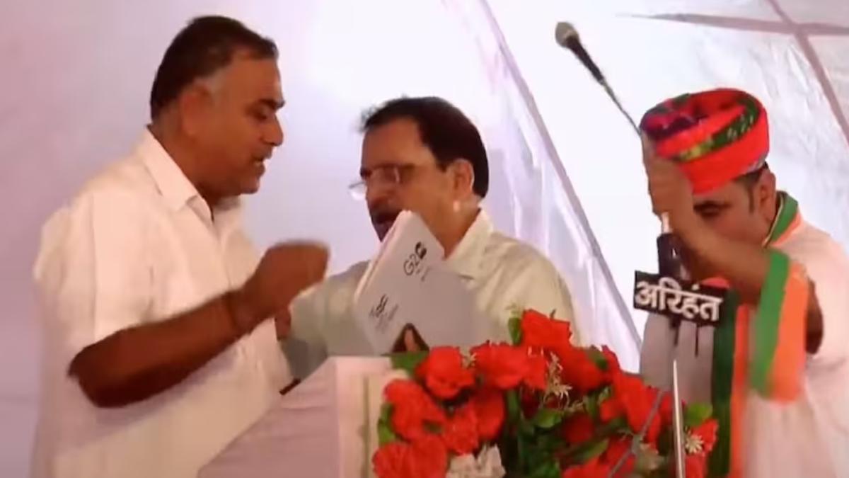 Video of BJP leader snatching mike at Rajnath Singh rally in Rajasthan ...